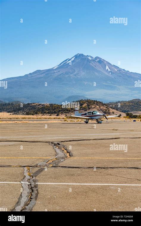 Small Propeller Aircraft At Weed Airport Off Stratovolkan Mount Shasta