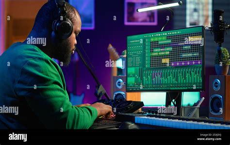 Skilled Audio Technician Editing Recorded Tracks From An Usb Stick