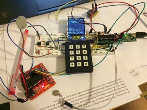 a pic based alarm clock system