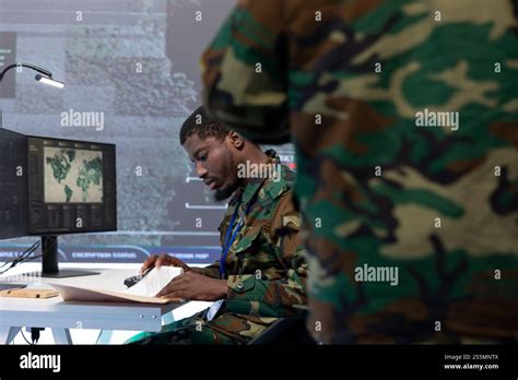 Military Officer Oversees Surveillance And Cybersecurity Operations In