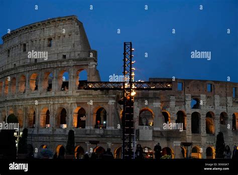 A Giant Cross Is Set Up In Front Of The Colosseum In Rome Ahead Of The