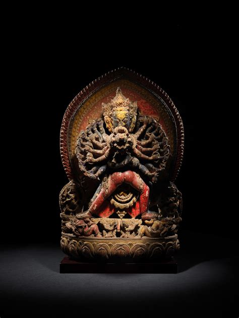 Bonhams A Polychrome Wood Figure Of Kalachakra And Visvamata Nepal