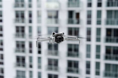 New Drone With Omnidirectional Obstacle Sensin 4k Camera And Props Flying In Air With Cityscape