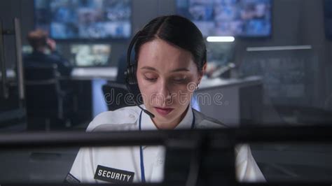 Female Worker Of Security Monitoring Center In Headset Stock Video