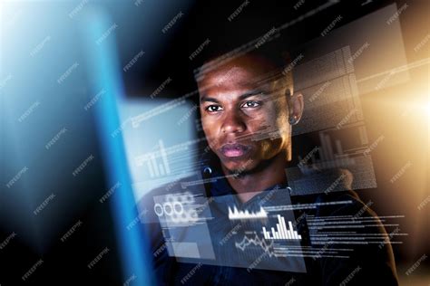 Premium Photo | Analysing the information cropped shot of a young male programmer sifting ...