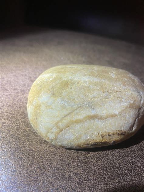 Fossilized Egg The Solid White Looks Like Eggshell And The Dark Lines Look An Egg Splitting