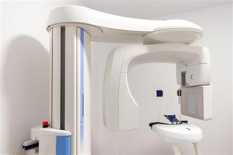 Premium Photo A Tooth Scanner In Dental Clinic With White Background