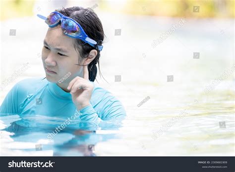 Person Cleaning Ear Water Photos Images And Pictures Shutterstock