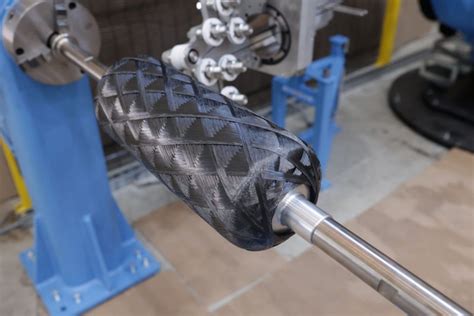 versatile robotic filament winding cell with single tape placement head
