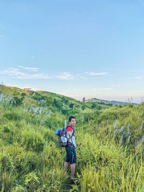 Premium Photo Full Length Of Man On Grass Against Sky