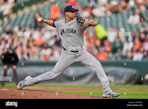 New York Yankees Starting Pitcher Carlos Carrasco Delivers During The