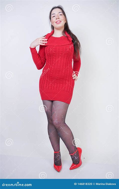 Pretty Asian Chubby Woman Posing In Red Knitted Dress And Black