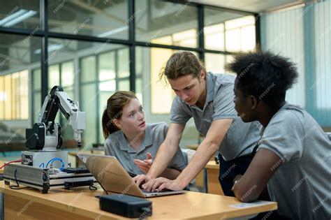 Premium Photo Trainee Robotics Engineer Learning With Programming And