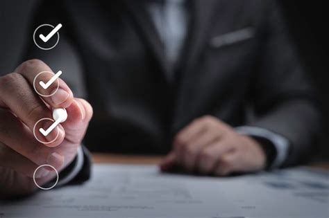Premium Photo Businessman Using Pen To Tick Correct Sign Mark In Checkbox For Quality Document