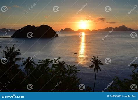 Beautiful Sunset At Las Cabanas Beach At El Nido In Philippines Stock