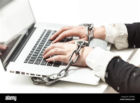 Photo Of Female Locked To Laptop By Chain Stock Photo Alamy