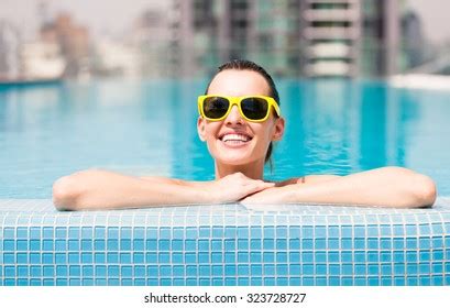 53 Thousand Tan Attractive Women Relaxing By Pool Royalty Free Images
