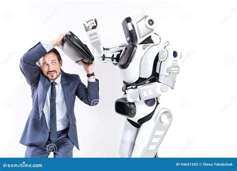Adult Frightened Businessman Is Escaping From Attacking Robot Stock