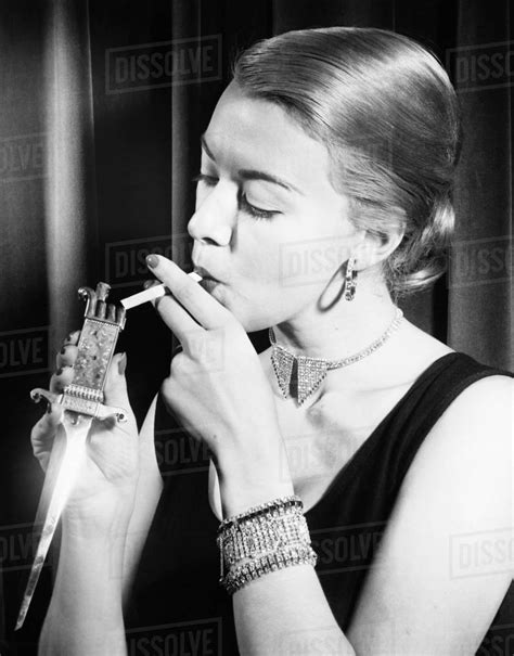 Beautiful Women Lighting Cigarettes