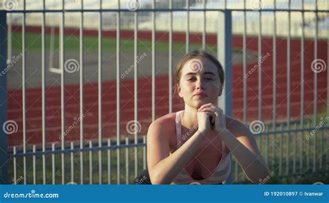 Sporty Woman Making Squats Outdoors Fit Girl Is Doing Aerobic