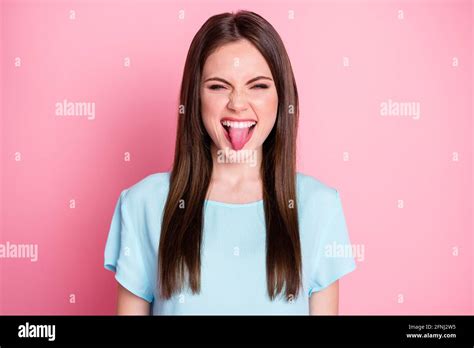 Funny childish lady sticking tongue out mouth wear casual blue t-shirt ...