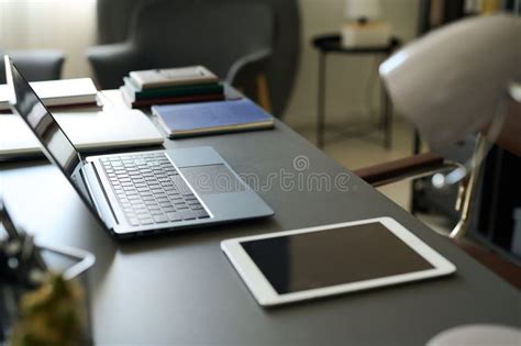 Modern Office Desk Featuring Laptop And Tablet Stock Illustration