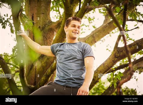 Man Climbing Tree Hi Res Stock Photography And Images Alamy