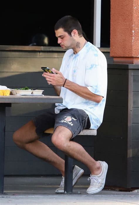 Noah Centineo Steps Out With A Shaved Head — And New Tattoo