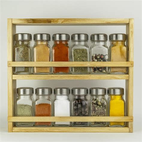 A Wooden Shelf With Spices And Spices Including One That Says Spices Premium AI Generated Image