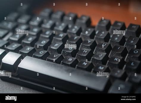 Close Up View Of A Black Computer Keyboard With Various Function Keys