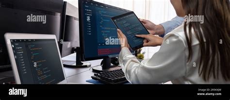 Software Development Team Working Together In Office Coding Script