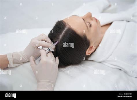 Doctor Hands Doing Injection Into Woman Scalp In Beauty Salon Stock Photo Alamy