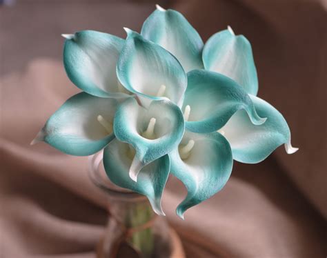 Teal And White Flower Centerpieces