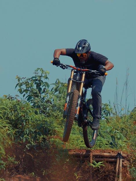 Premium Photo Man Riding Bicycle