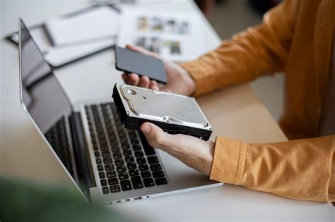 Free Photo Man Using External Storage Used
