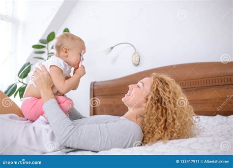 Cheerful Woman Having Fun With Her Lovely Baby Stock Image Image Of Comfortable Innocence