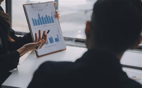 Premium Photo Business Professionals Group Of Young Confident Business People Analyzing Data