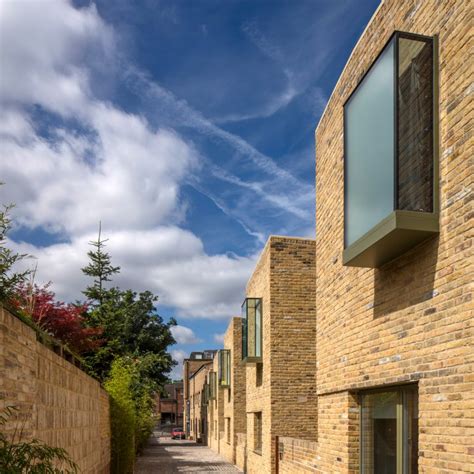 Pivoting Louvres Conceal Windows Of Mews House By Belsize Architects