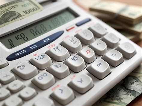 premium ai image fee calculation the word fees on a calculator