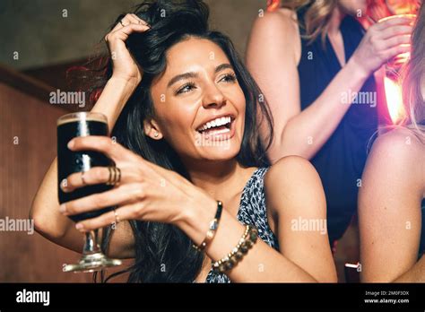 Young Woman With Beer Alcohol And Party At Nightclub With New Year