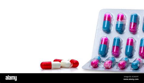 Red White Antibiotic Capsule Pills And Pink Blue Anti Fungal Granules