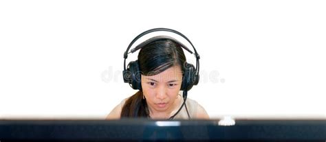 Woman Uses A Headset With Microphone On A Personal Computer Stock Photo Image Of Asian