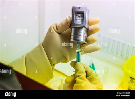 Syringe Equiped With A Lead Shield To Protect The Technician From The