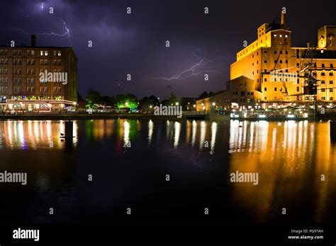 The Modernized Inner Harbor Area In Duisburg Germany During A Thunderstorm With Reflection