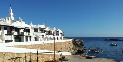 Menorcas Binibeca Vell Contemplates Ban Amid Overtourism Crisis The Traveller Trails