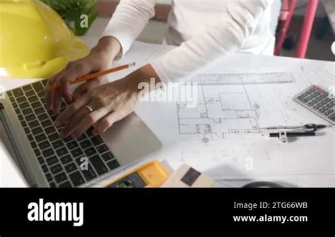 Architectural Project Workplace Architect Typing Laptop Keyboard To Review Design Of House