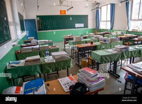 Chinese Classroom With Desks With Books At Middle School In Zhaozhou