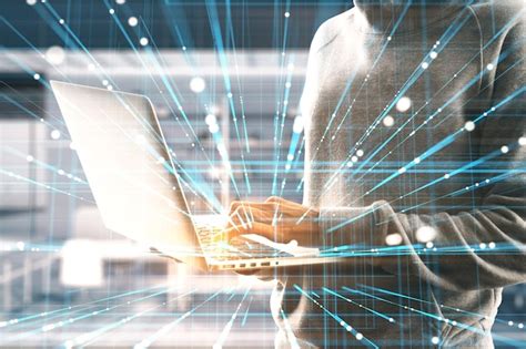 Premium Photo Hacker Using Laptop With Creative Linear Matrix Hologram On Blurry Office