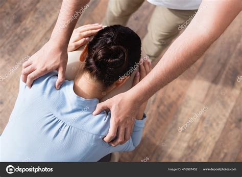 Top View Masseur Doing Seated Massage Shoulders Brunette Woman Textured