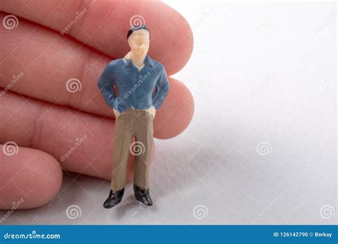 Tiny Figurine Of Man Model In View Stock Photo Image Of Figures Body 126142790